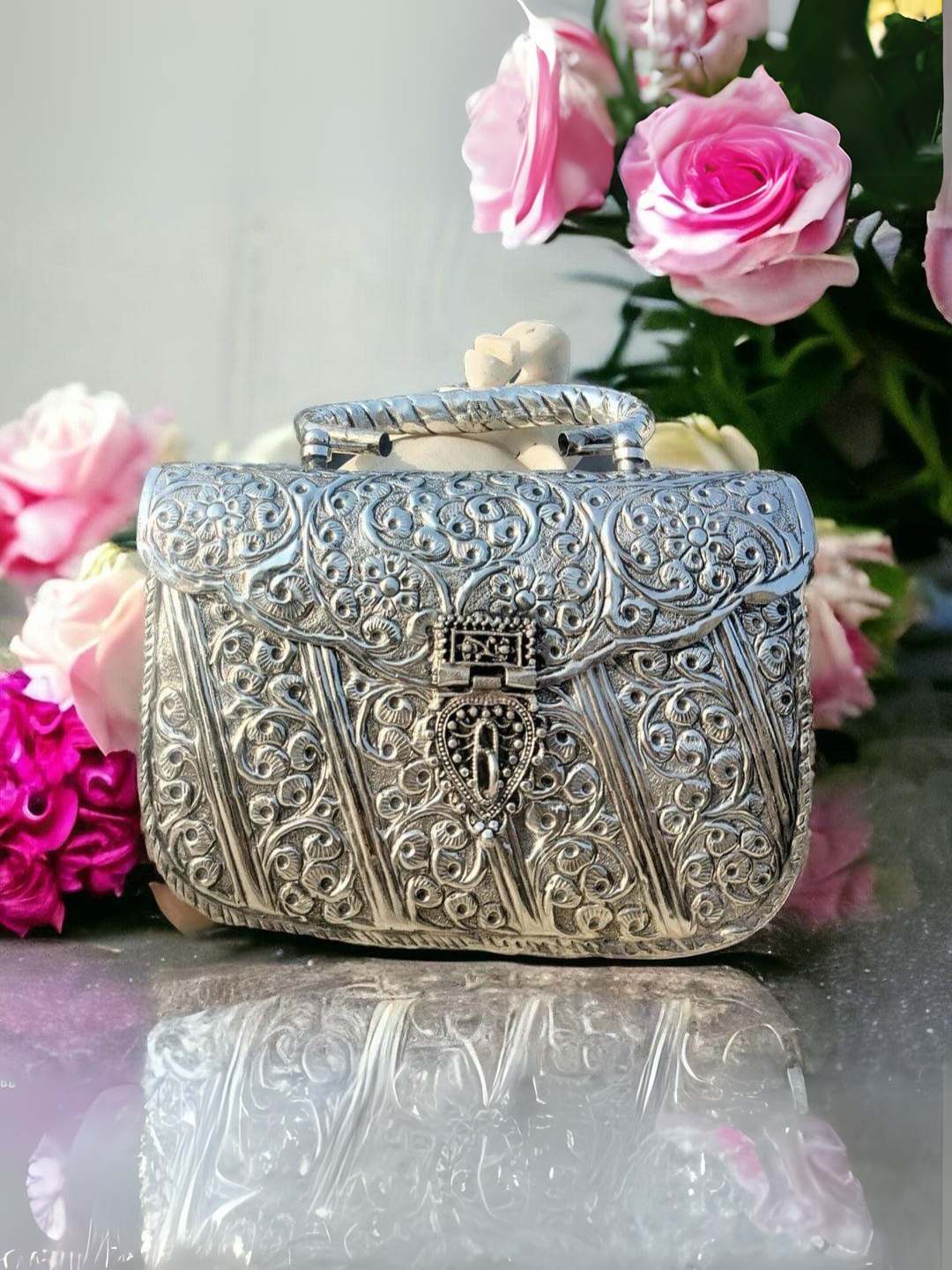 Buy Handcrafted Stone Embedded Metal Clutch Online - Ishhaara